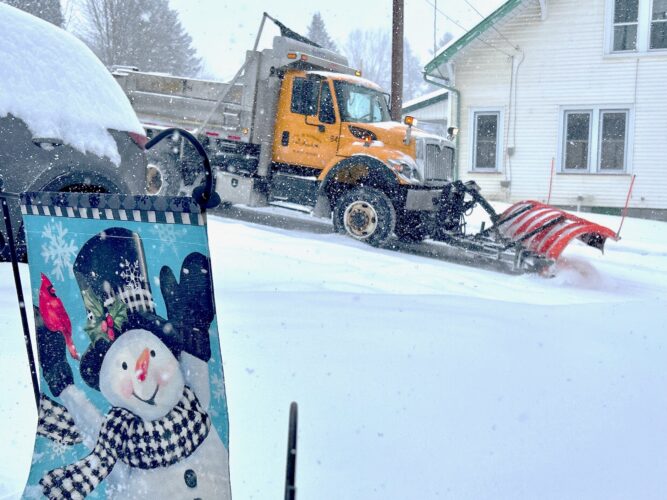 Plowed under: Snowstorm dumps double digits on area as hundreds of ...